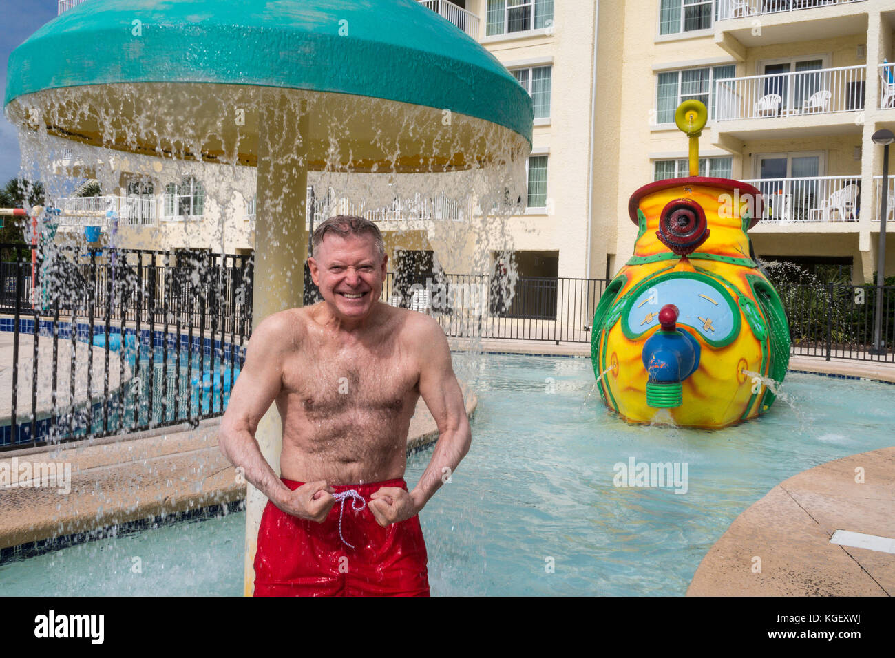 Senior Man Enjoying Resort Swimming Pool, USA Stock Photo - Alamy