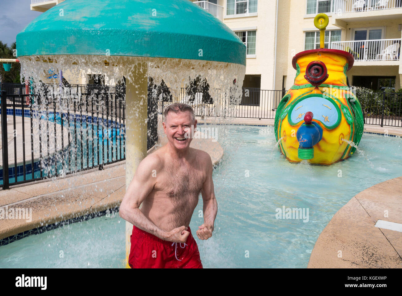 Senior Man Enjoying Resort Swimming Pool, USA Stock Photo - Alamy