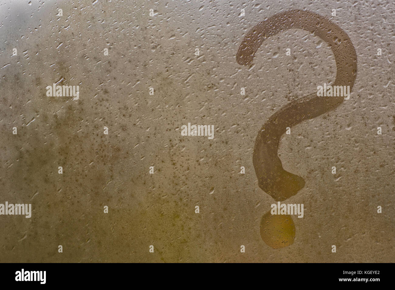 inscription on the sweaty glass with the finger is a question mark ...