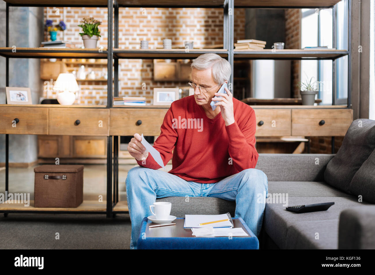 Elderly man making phone call hi-res stock photography and images - Alamy
