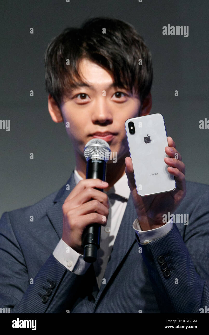 Japanese actor Ryoma Takeuchi receives an iPhone X as present during a ...