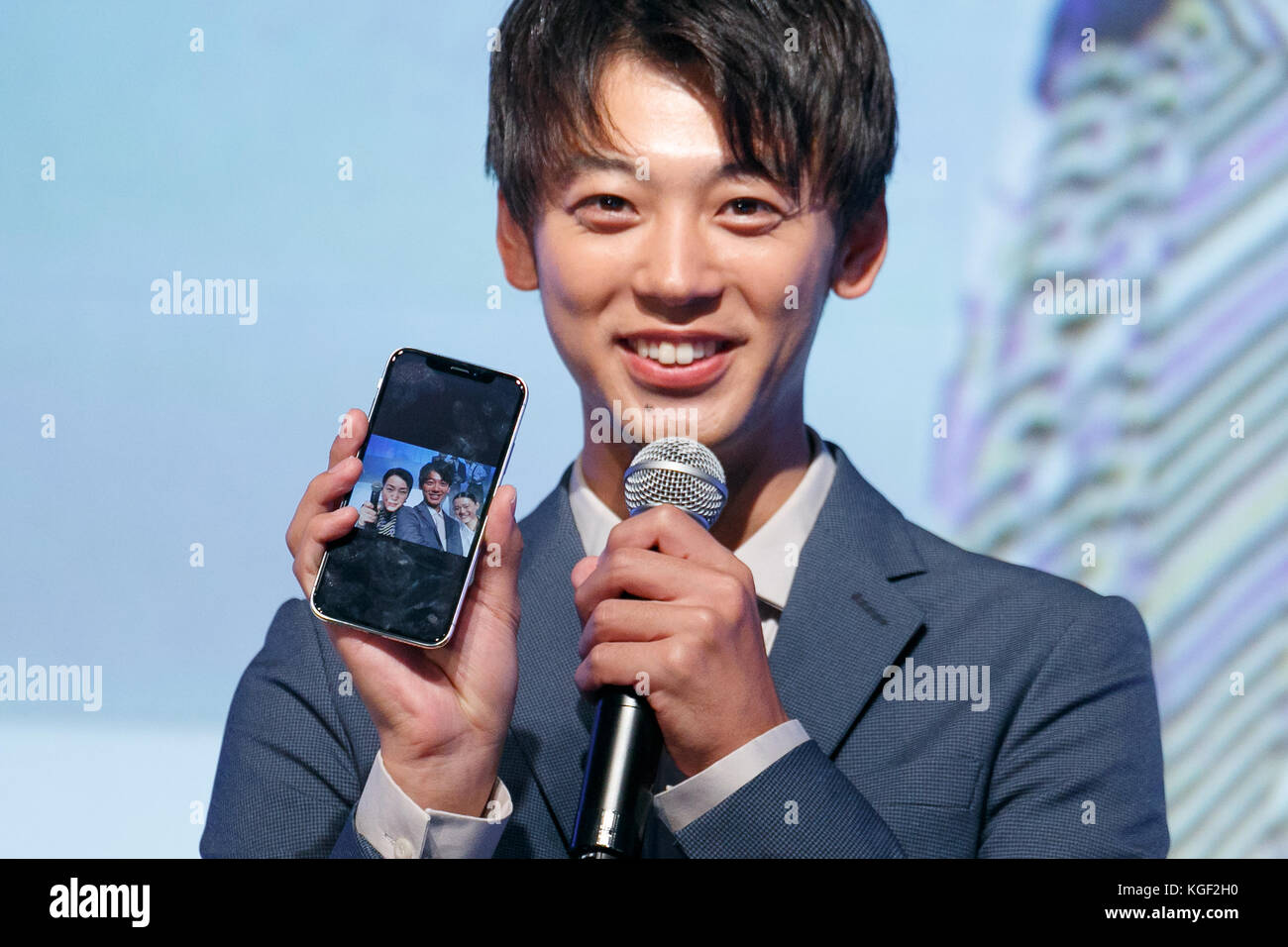 Japanese actor Ryoma Takeuchi shows a selfie taken with his new iPhone ...