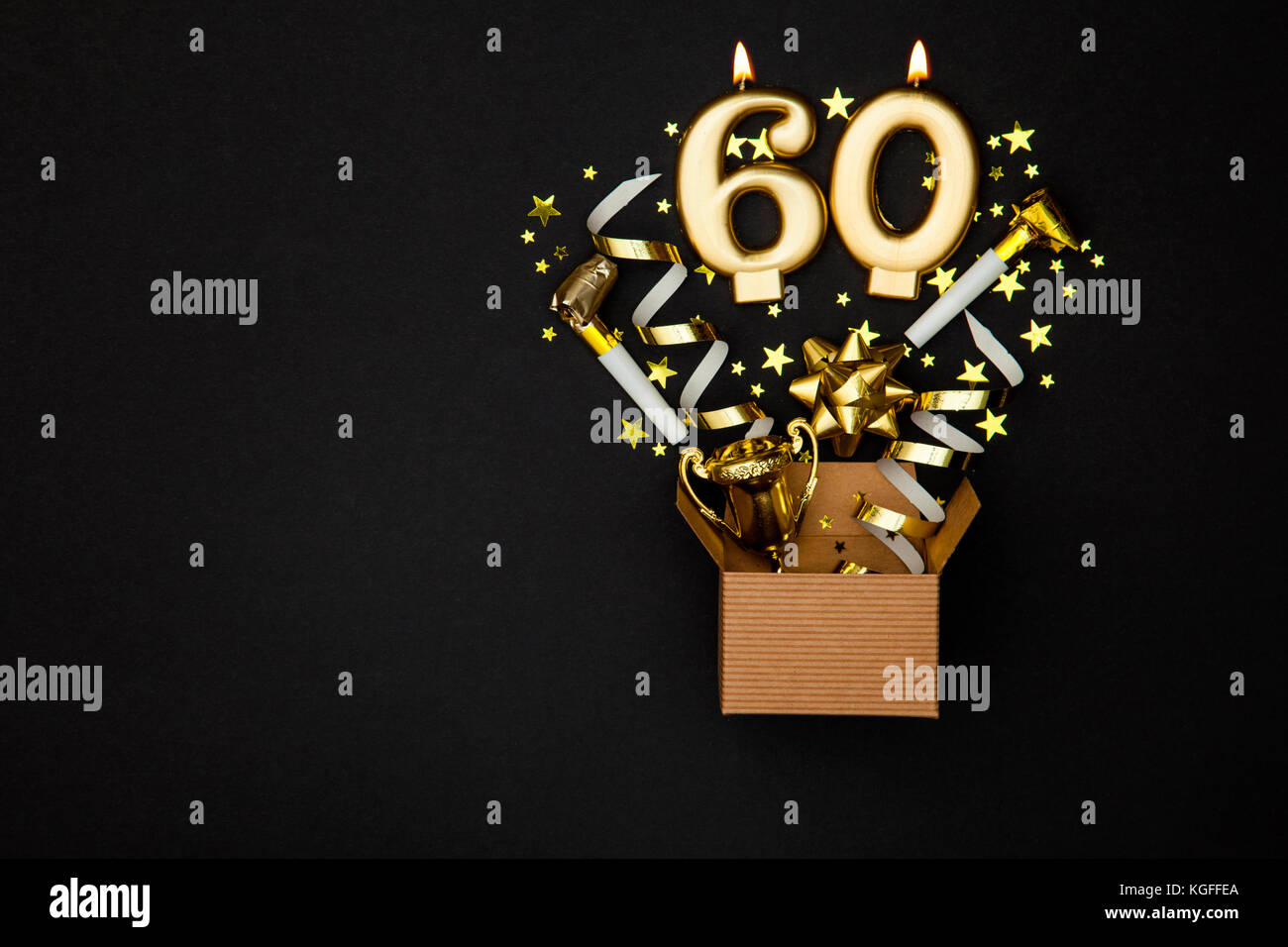Number 60 gold celebration candle and gift box background Stock Photo ...