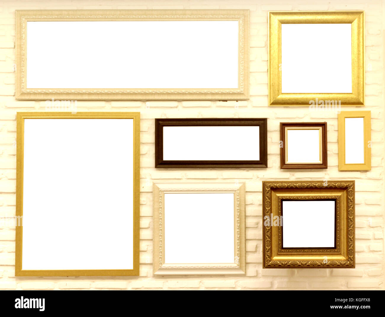 pile of empty picture frames on brick wall Stock Photo - Alamy
