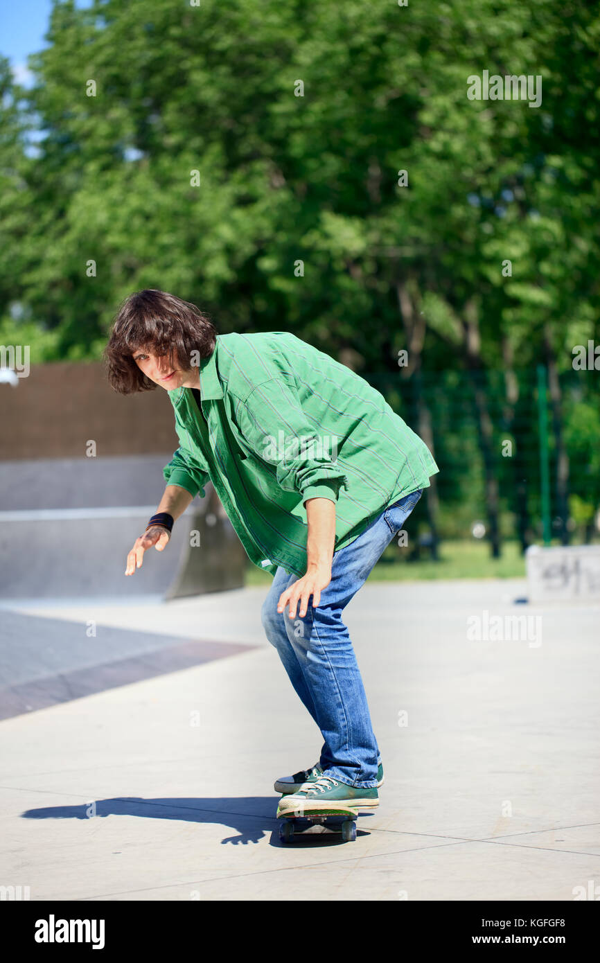 Boy on skateboard at a skate park Stock Photo - Alamy