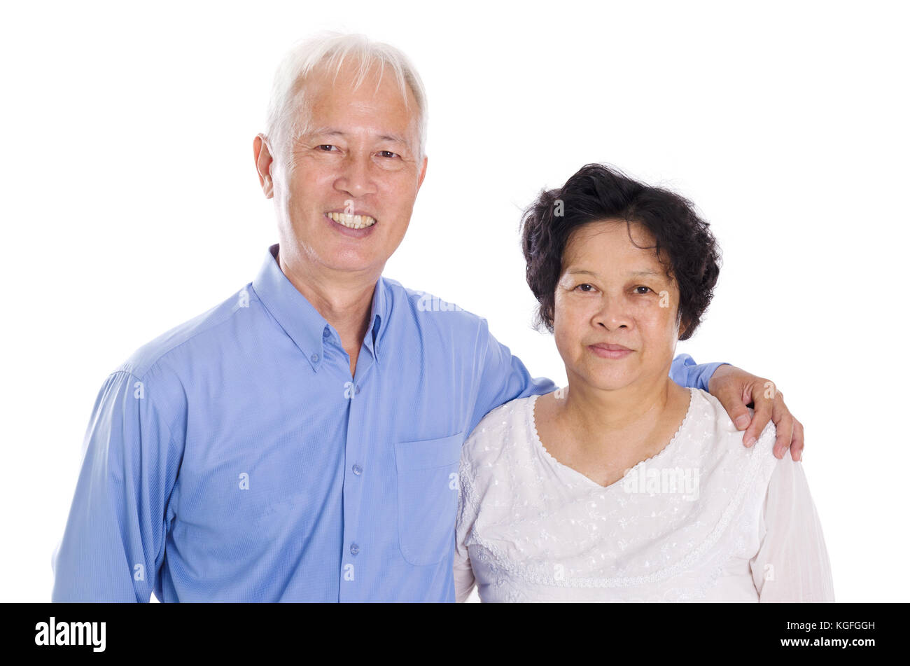 Happy Asian old couple smiling, standing isolated on white background ...