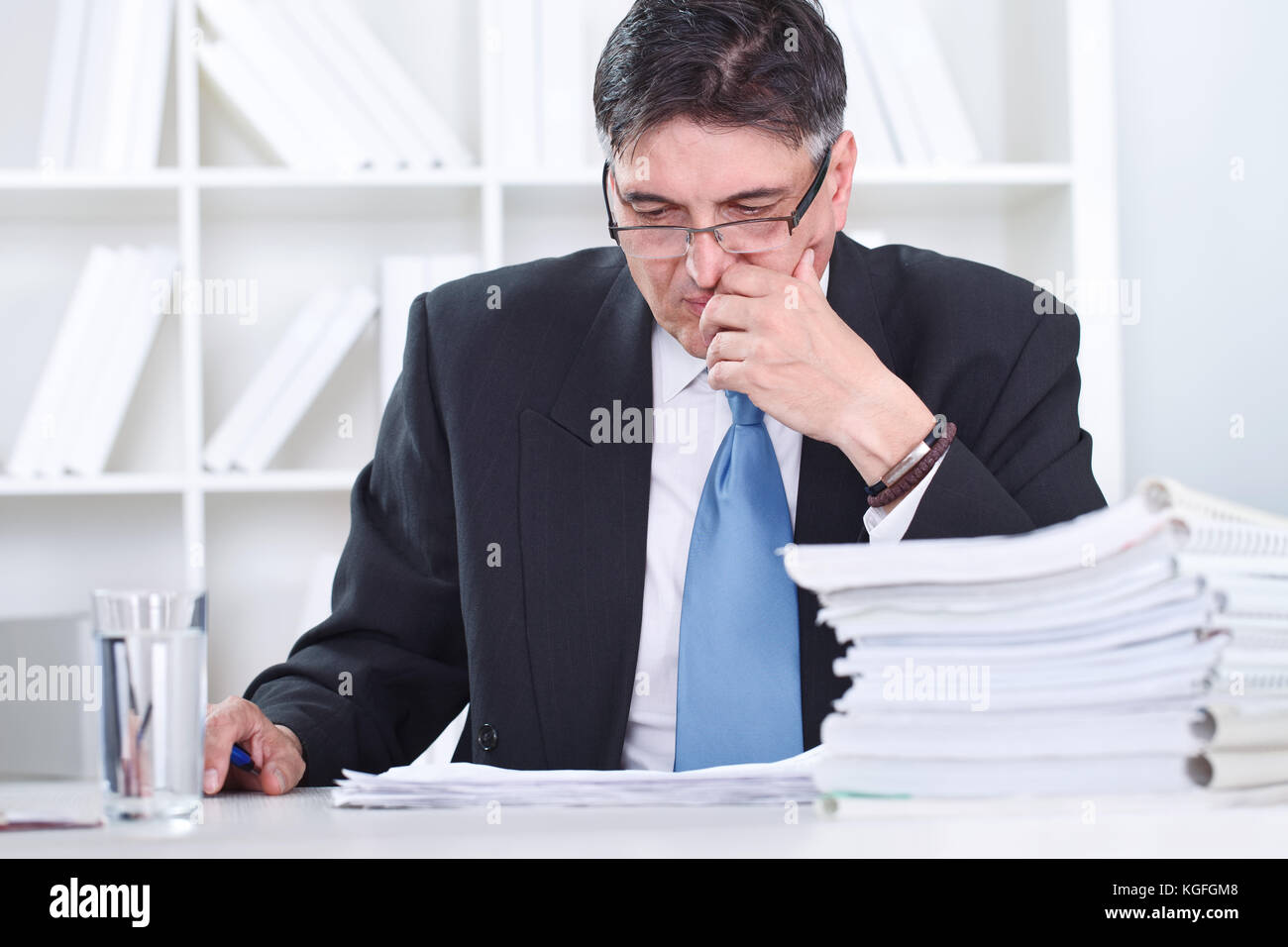 Senior businessman concentrate on work in office Stock Photo - Alamy