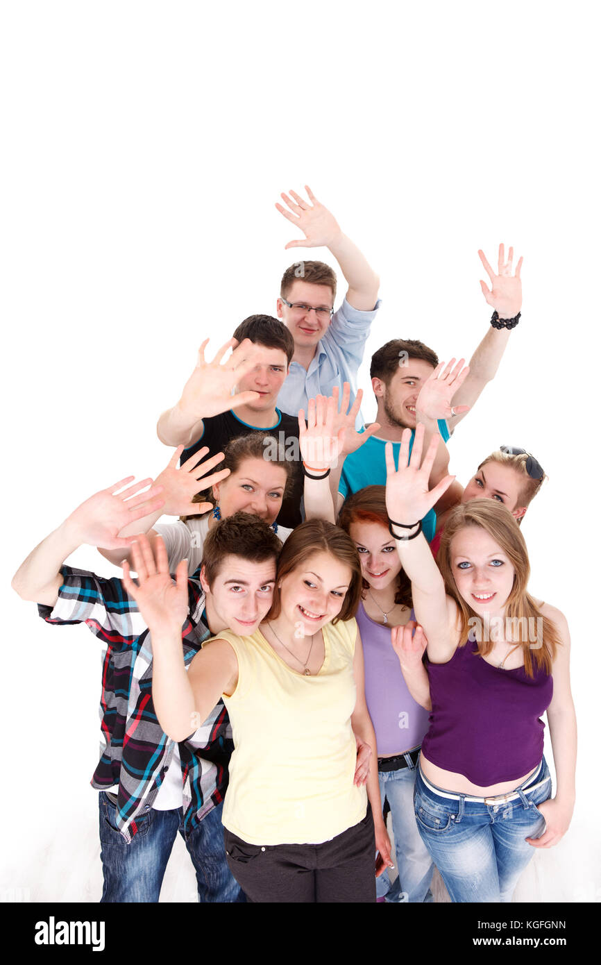 Group of young smiling friends waving their arms on white background ...