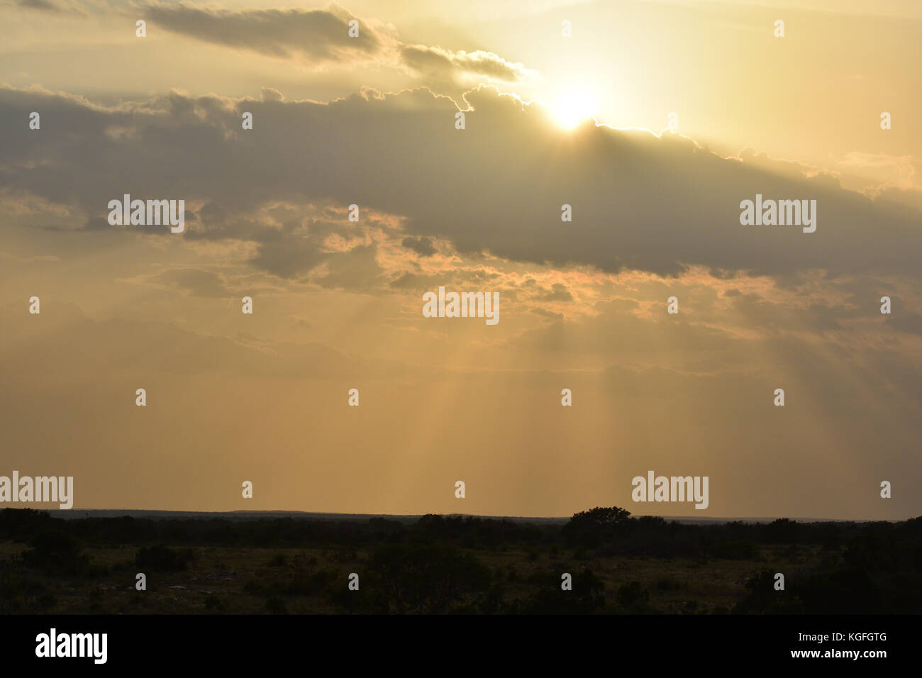 Bright Sun rays Shining though Clouds Stock Photo - Alamy