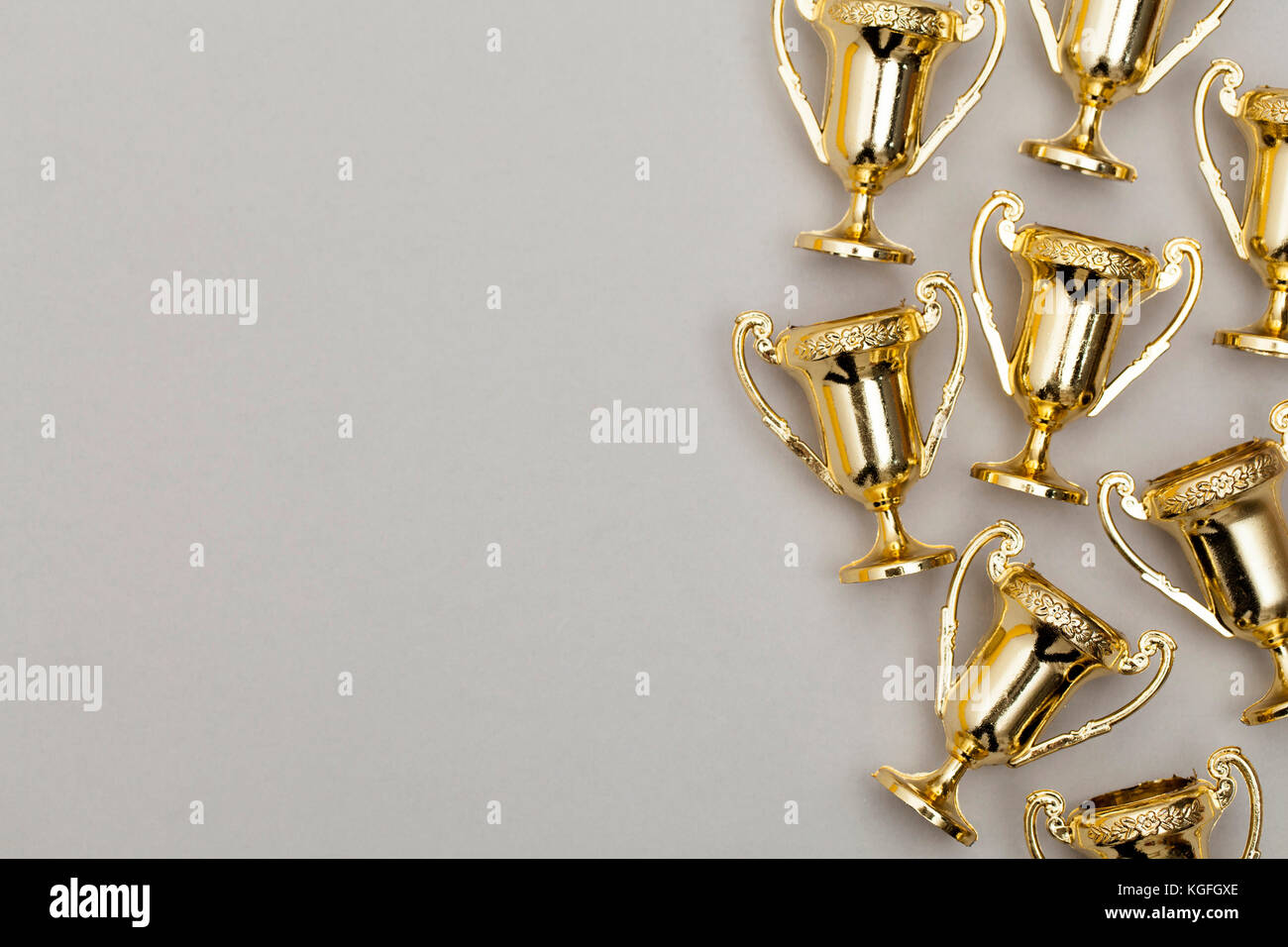 Gold winners achievement trophy background Stock Photo - Alamy