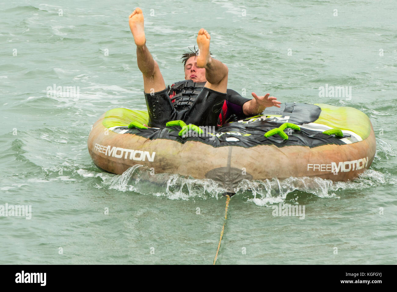 Horizontal close-up of a caucasian man about to back flip on an ...