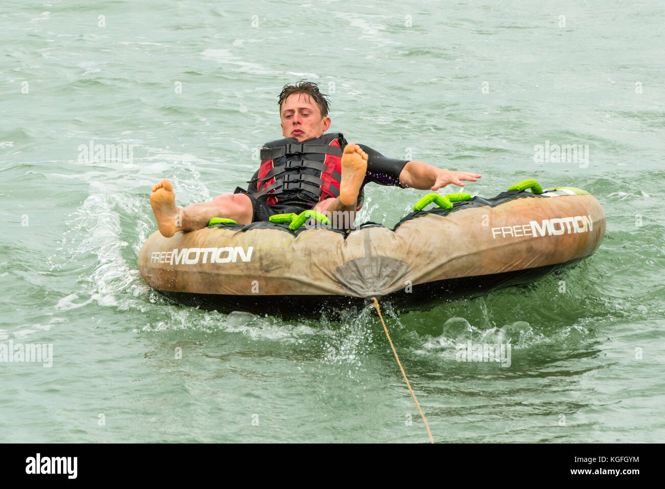 Horizontal close-up of a caucasian man about to back flip on an ...