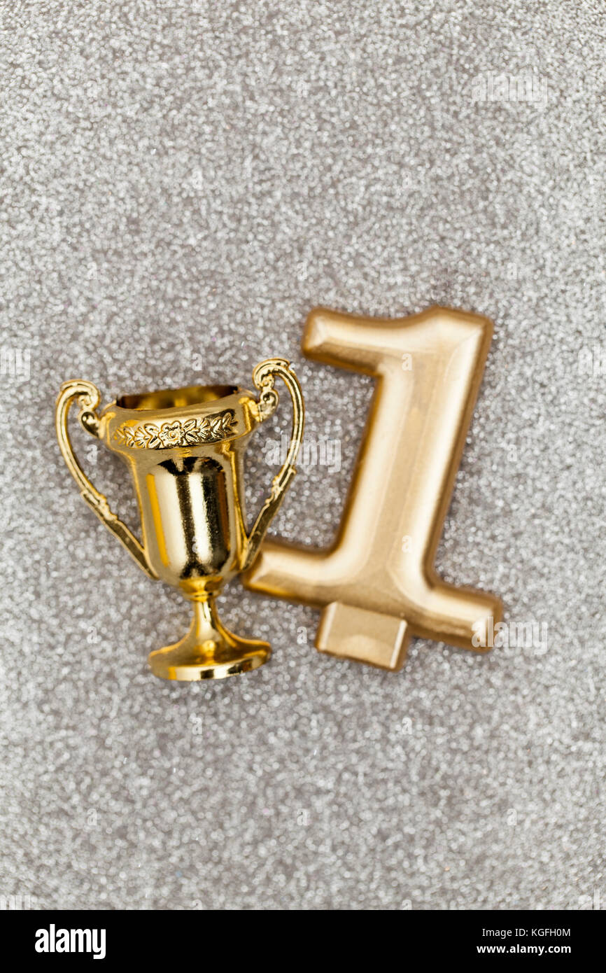 Gold winners achievement trophy background Stock Photo - Alamy