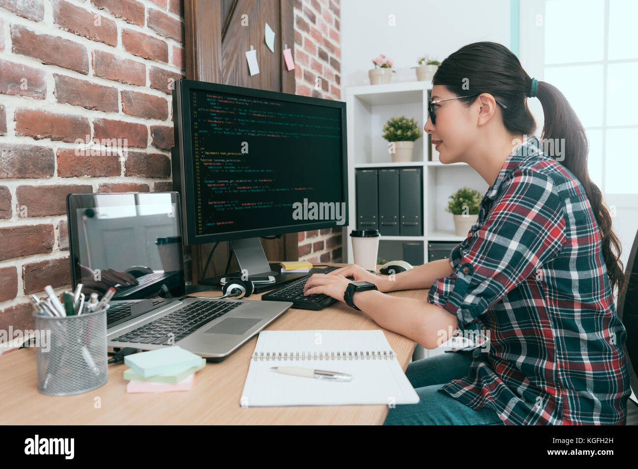 beauty smiling female programmer using computer working in office and ... beauty smiling female programmer using computer working in office and ...