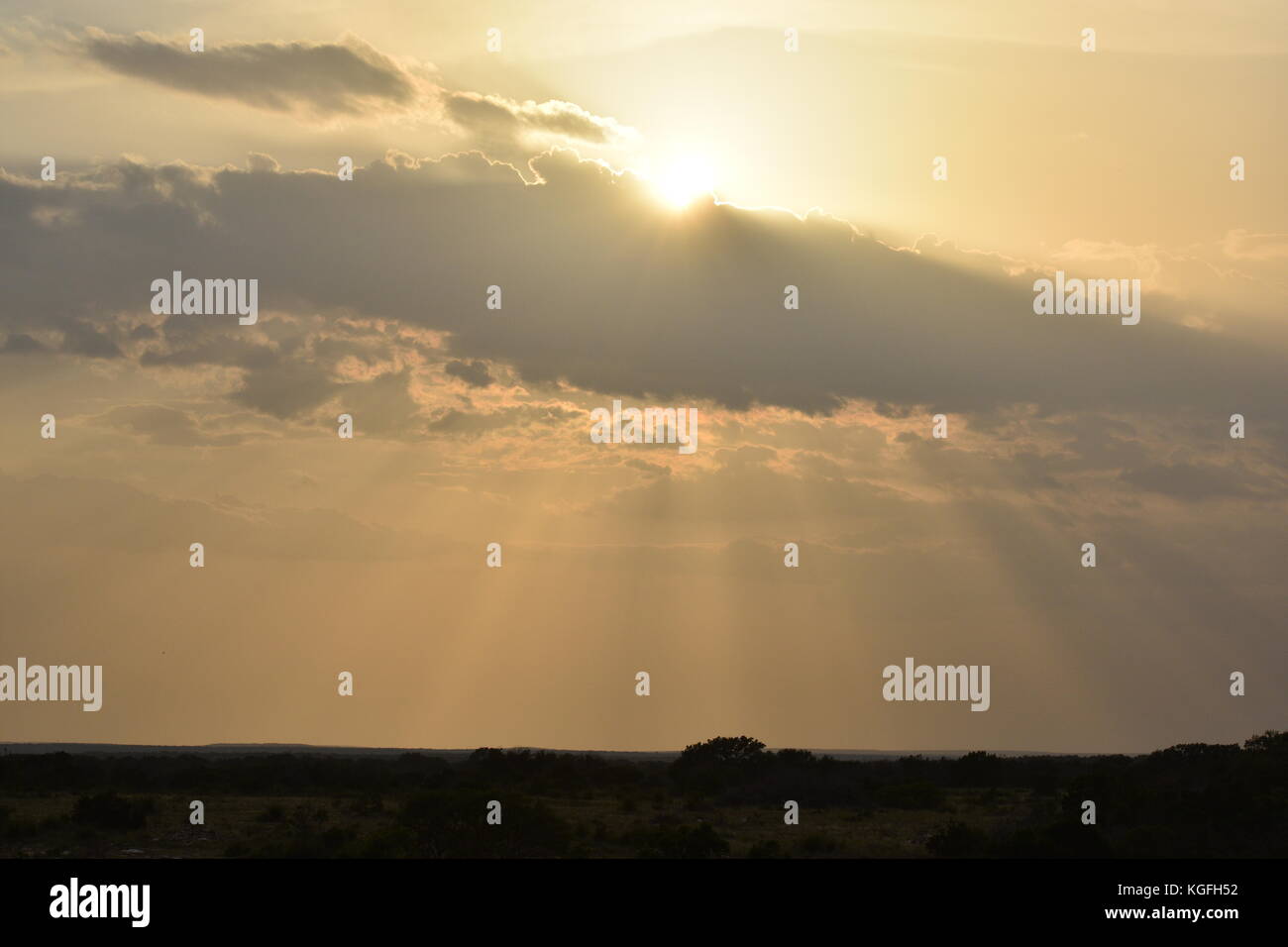 Bright Sun rays Shining though Clouds Stock Photo - Alamy