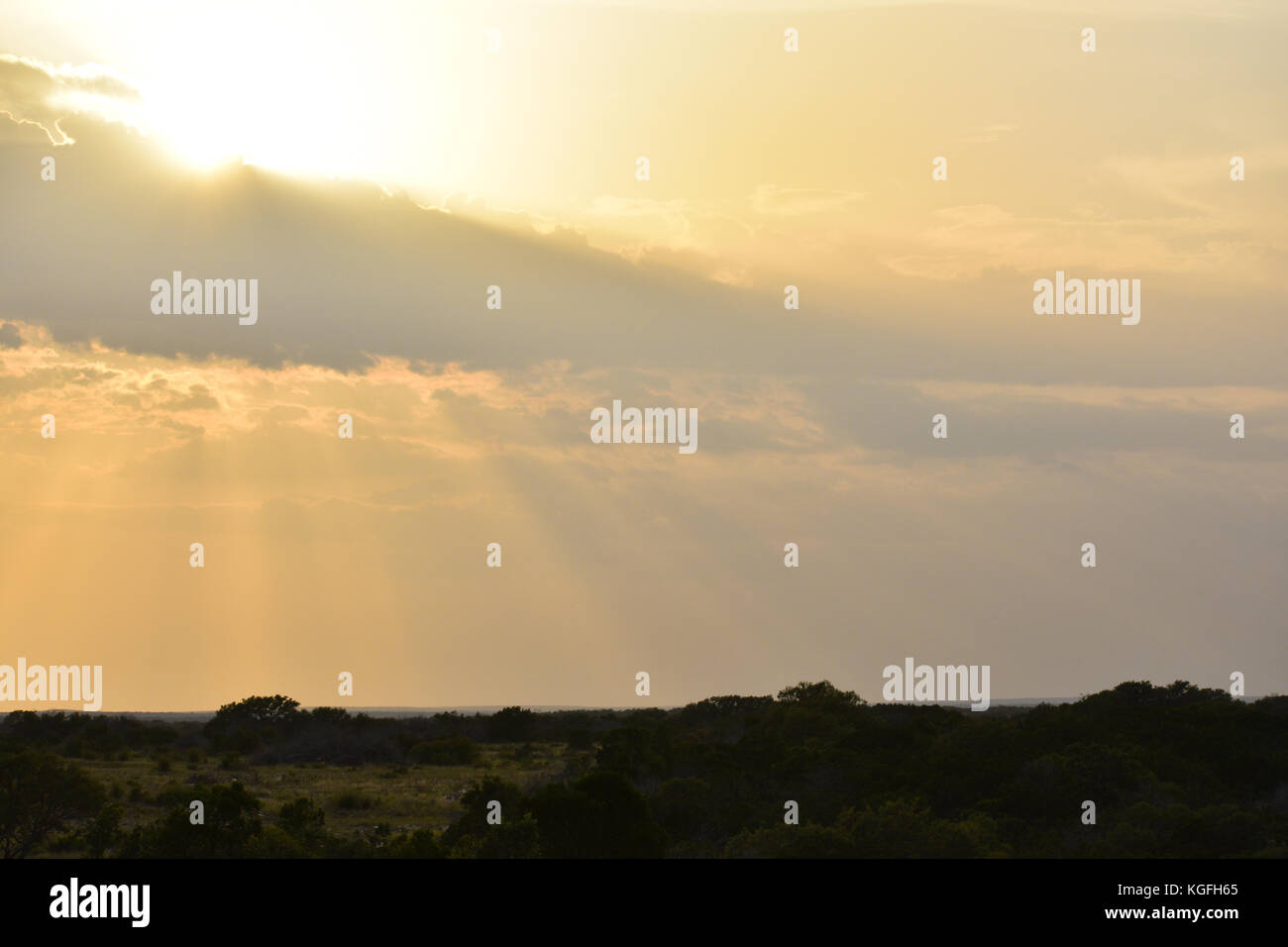 Bright Sun rays Shining though Clouds Stock Photo - Alamy