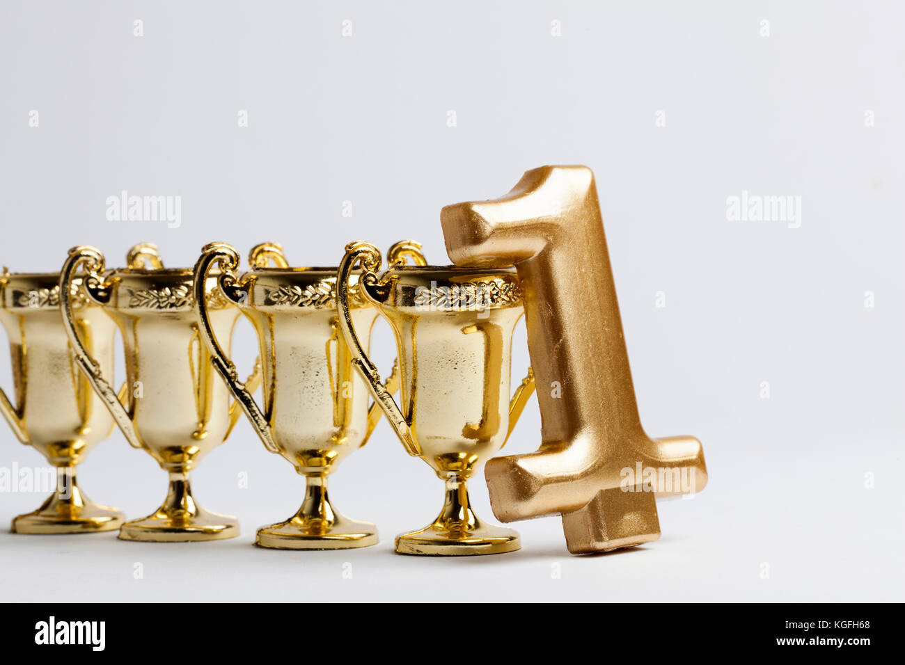 Gold winners achievement trophy background Stock Photo - Alamy