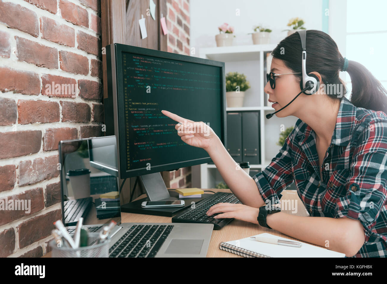 pretty beauty programmer woman wearing headset microphone talking with ...