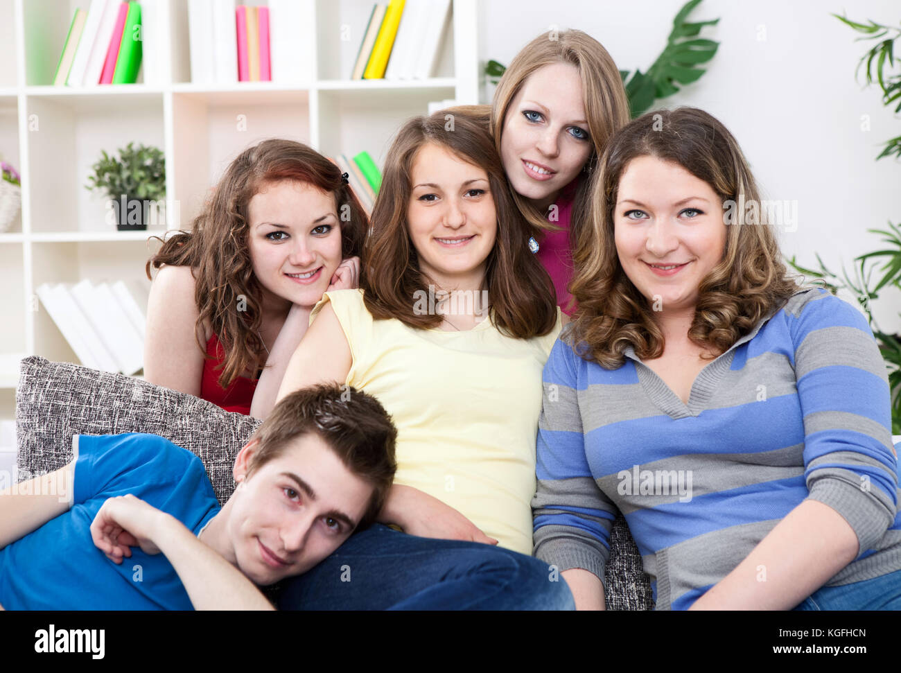 Smiling young teenagers friends together Stock Photo - Alamy