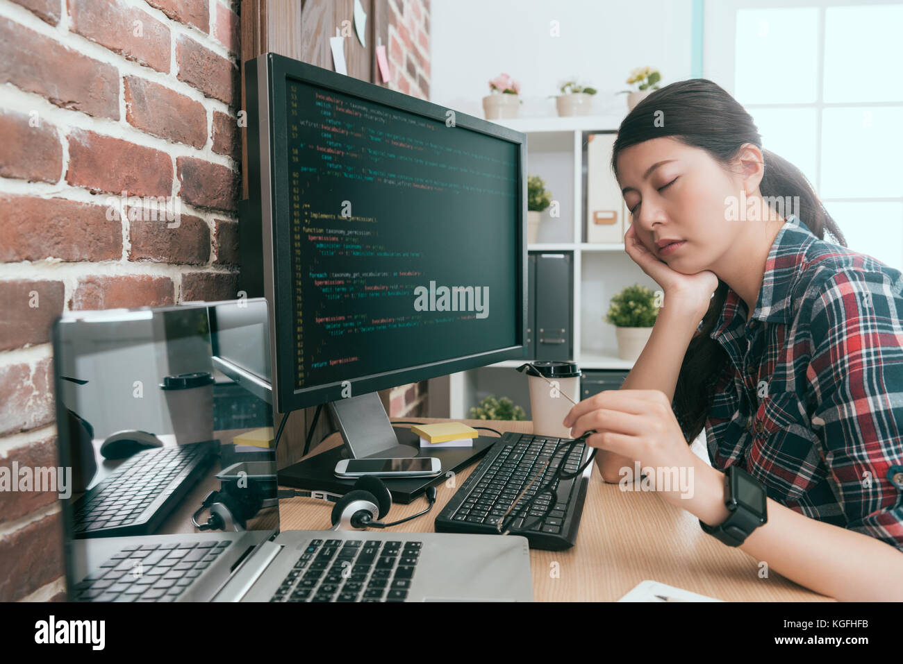 pretty elegant lady computer developer sitting in front of working ...