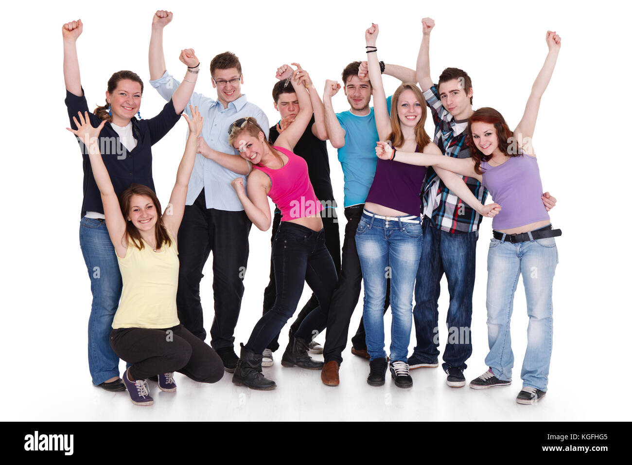 happy group of friends with arms up isolated over a white background ...