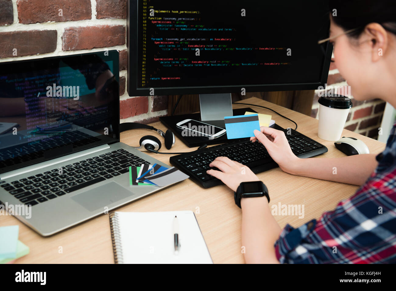 selective focus photo of young pretty female programmer using code ...