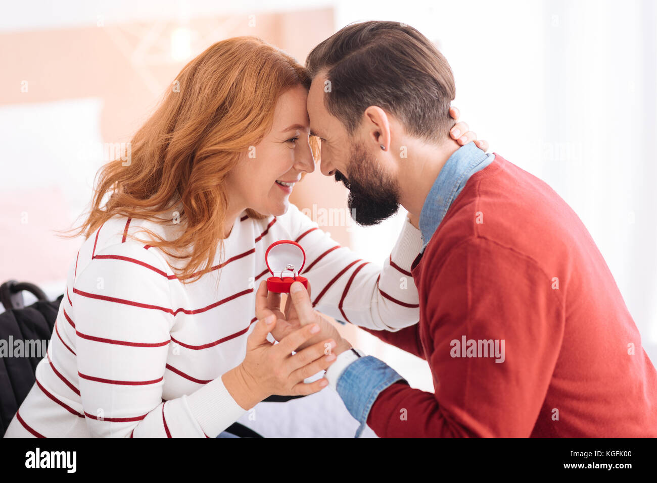 Happy man and woman caressing each other Stock Photo - Alamy