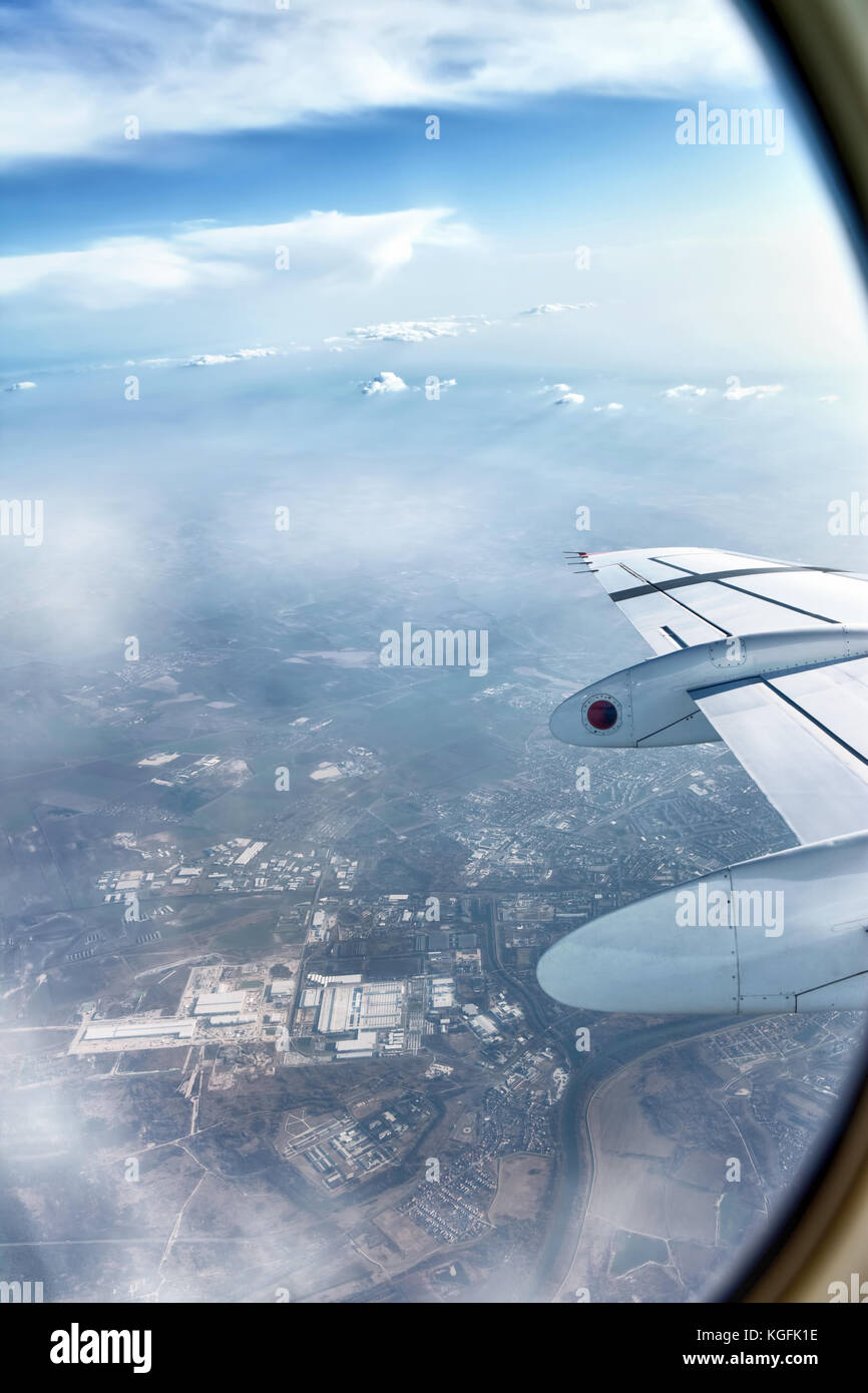 Looking through window aircraft during flight in wing with a nice blue ...