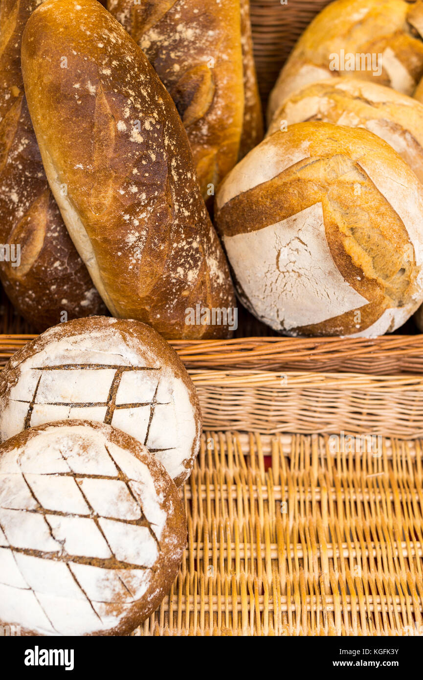 Selection fo various cereal homemade breads on display Stock Photo - Alamy