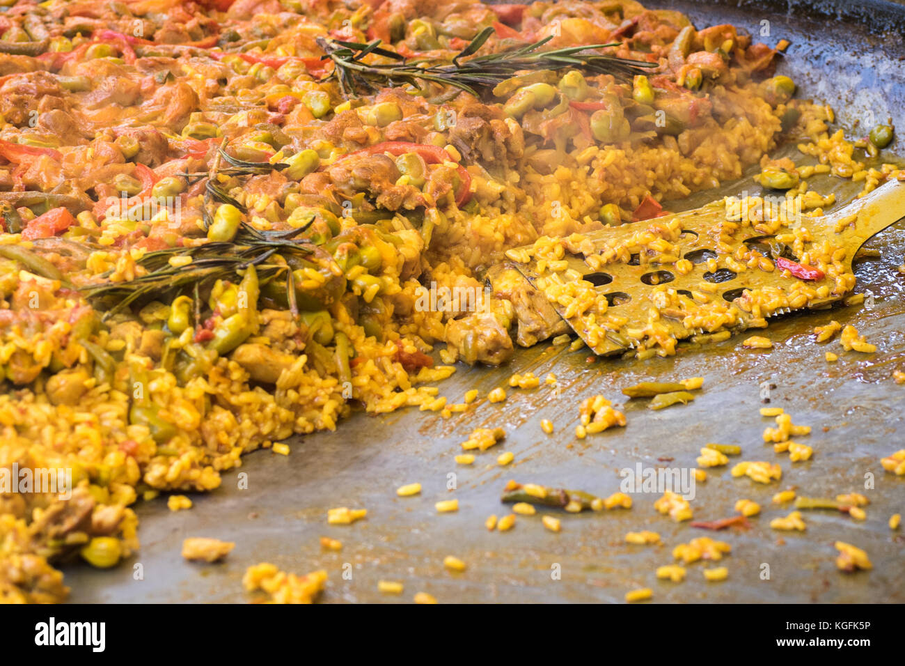 Traditional spanish chicken paella on big pan, food market Stock Photo ...