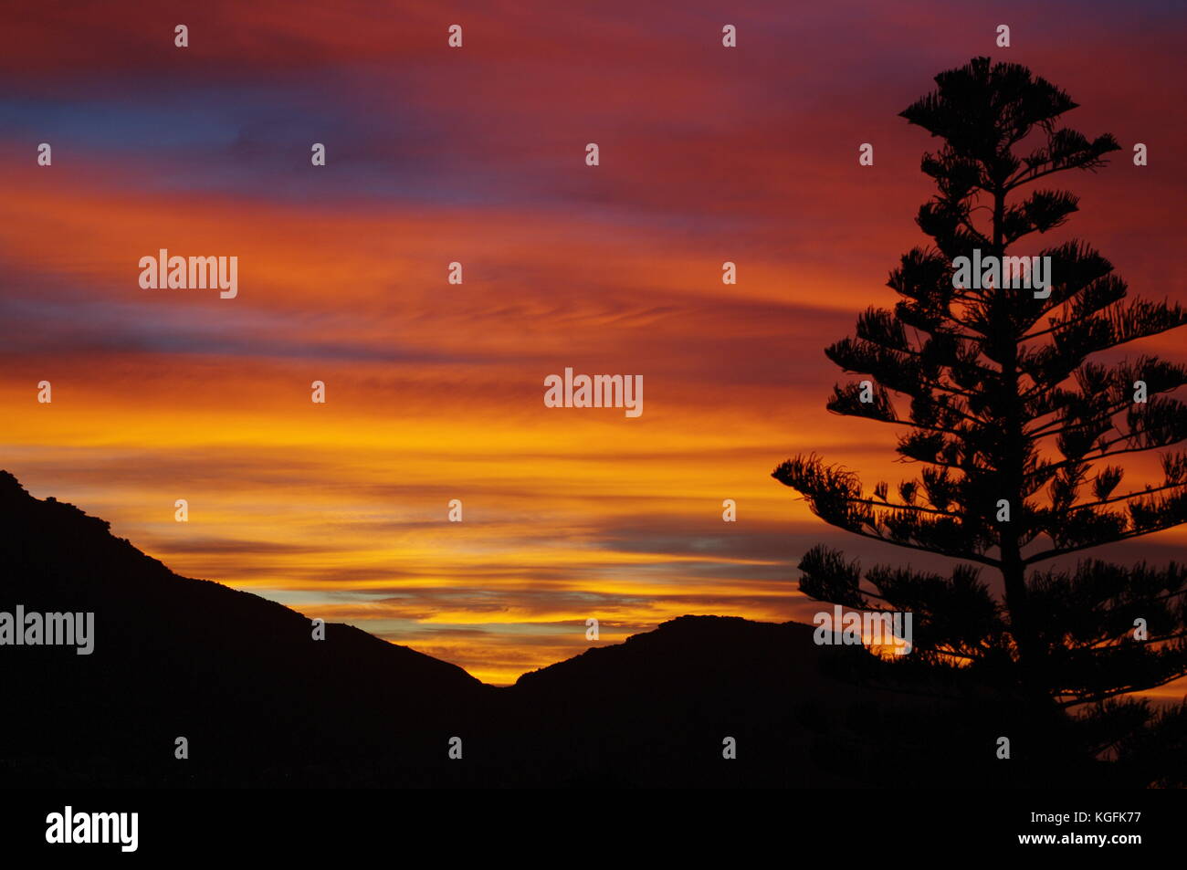 Sunrise fire in the sky Stock Photo - Alamy