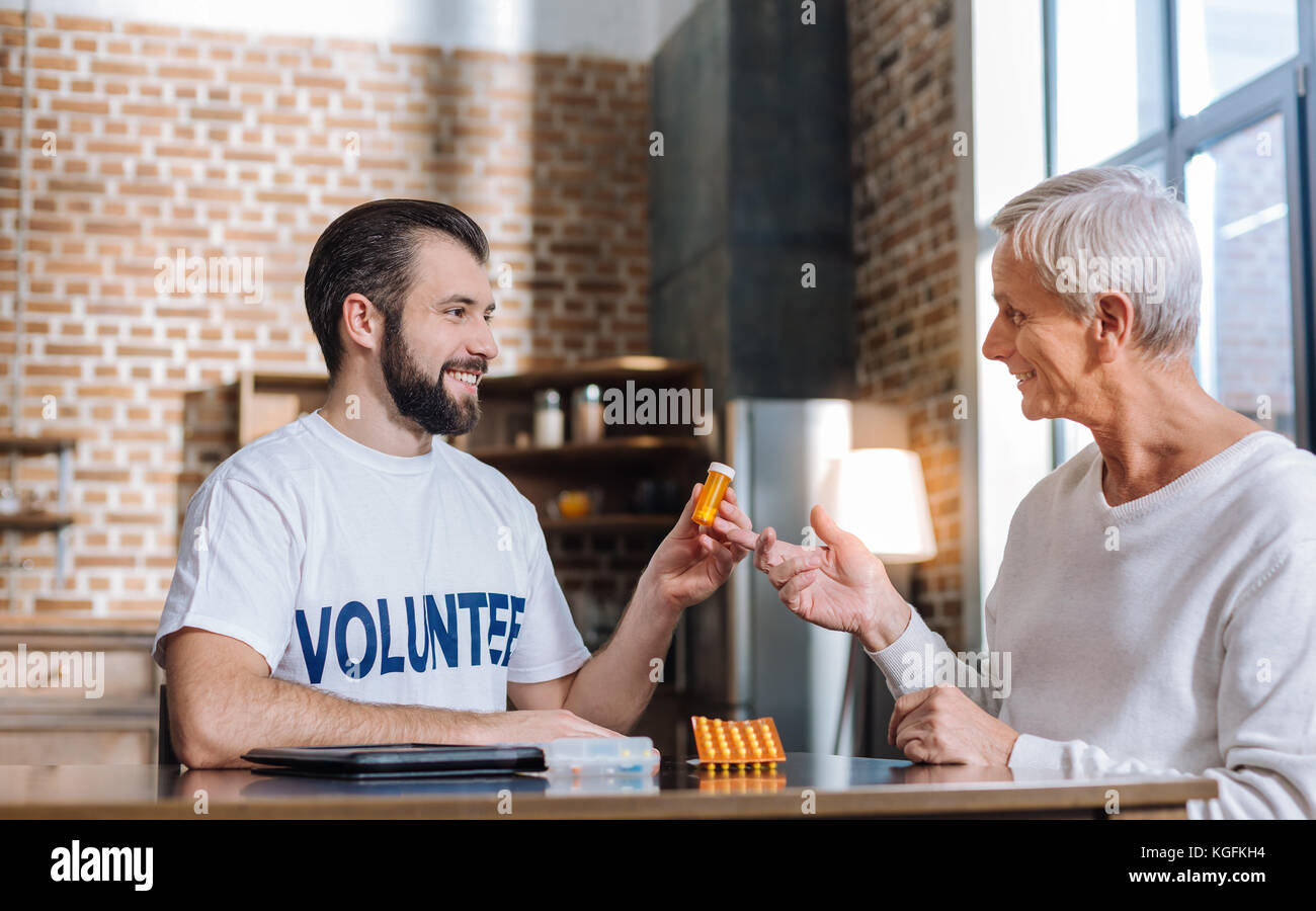 Cheerful kind pensioner looking satisfied with his treatment Stock ...