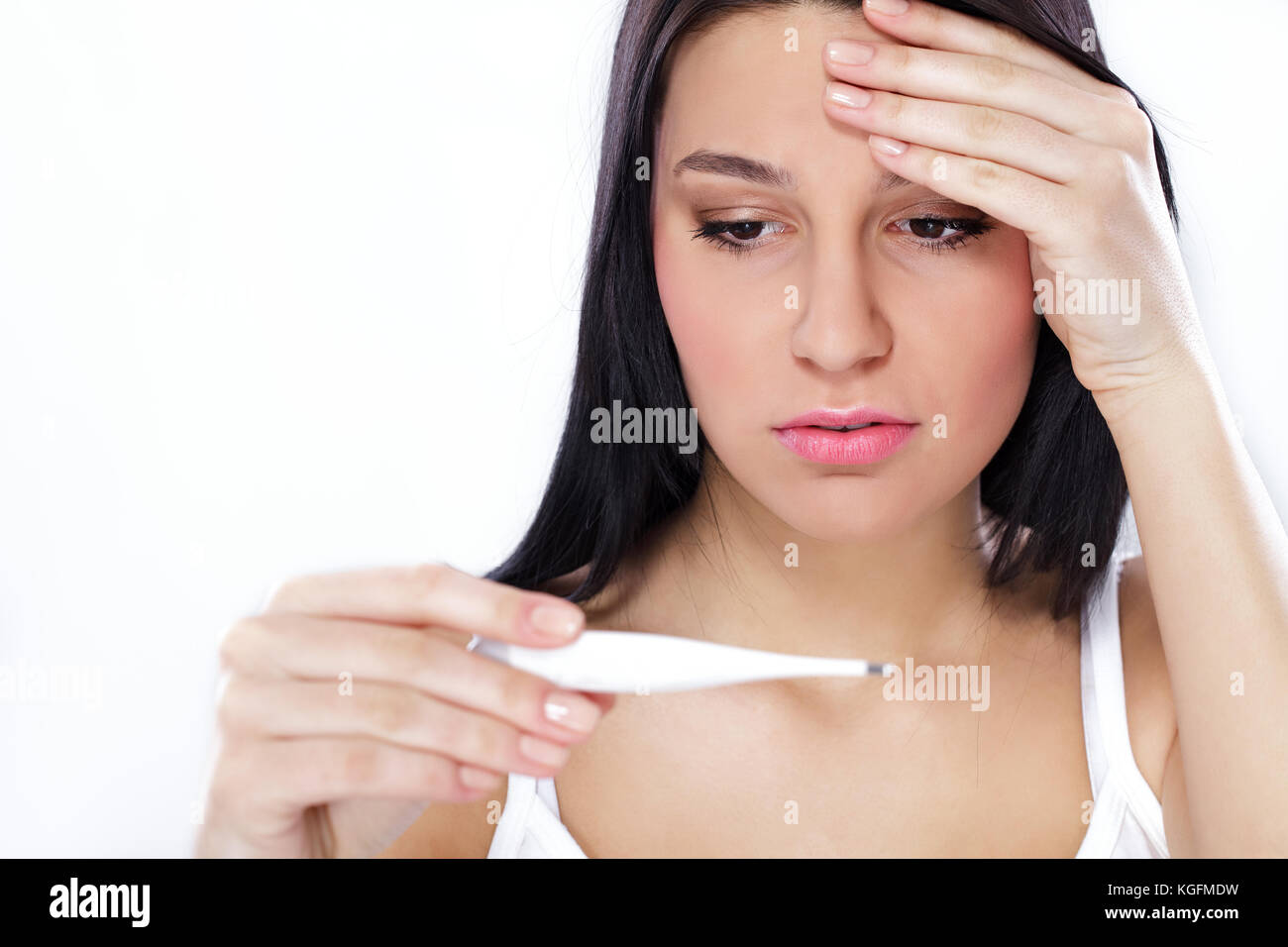 Young woman checking temperature close up shoot Stock Photo - Alamy