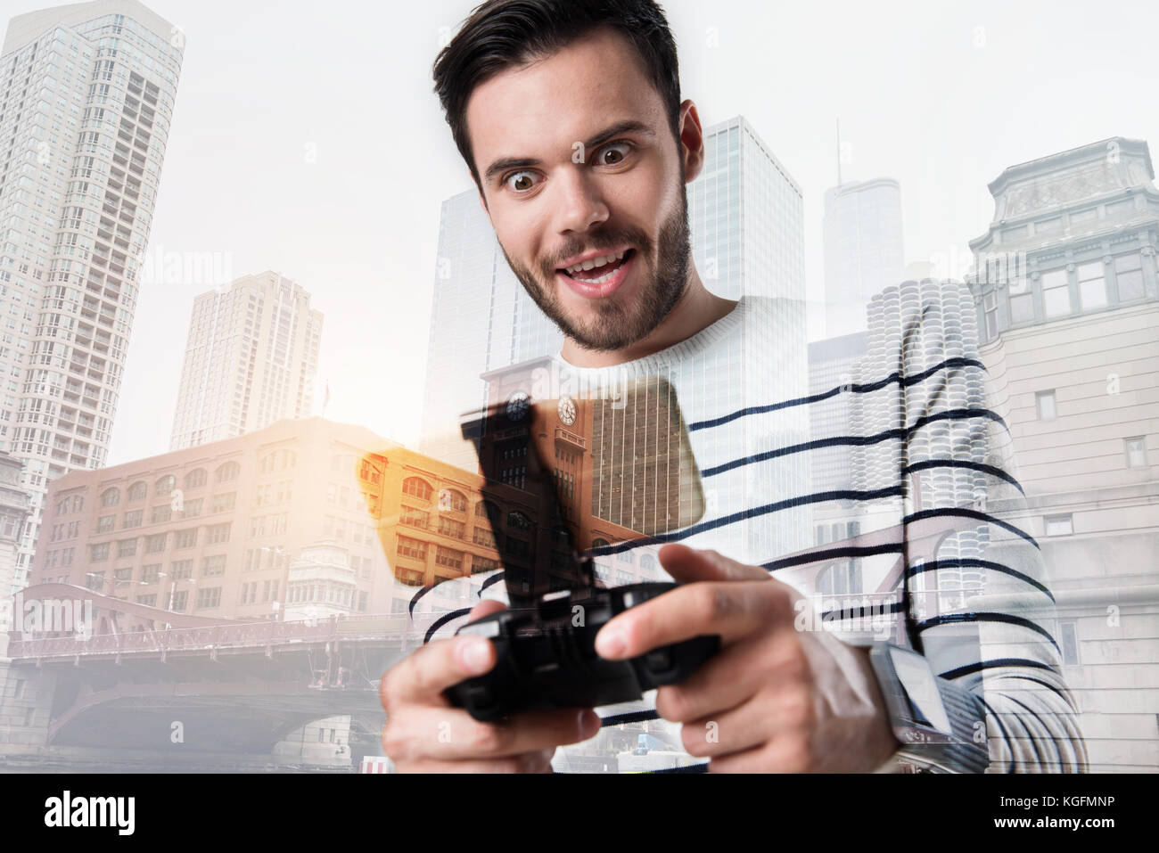 Excited happy man looking at the screen of his smart phone Stock Photo ...