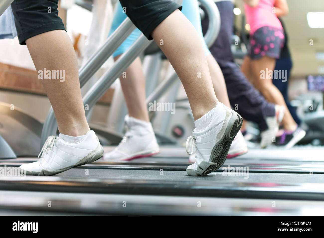 Jogging on treadmill, focus on the treadmill, blurred motion Stock ...