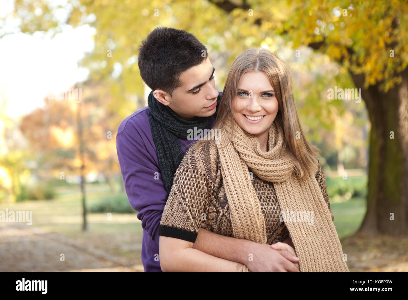 happy loving couple, young man embracing his girlfriend Stock Photo - Alamy