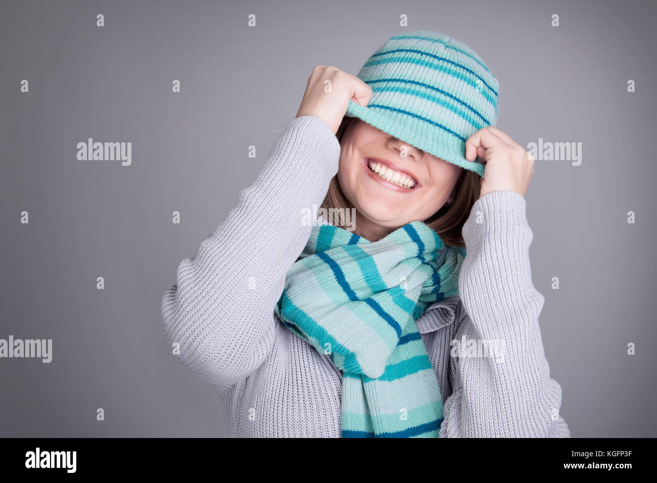 Laughing playful woman Stock Photo - Alamy