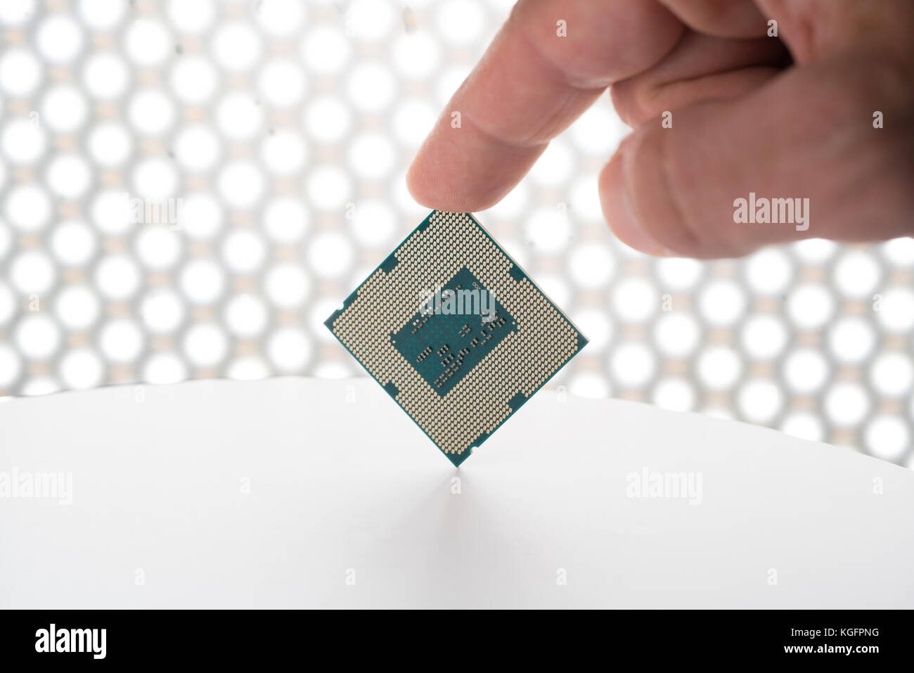 Processor in hand hi-res stock photography and images - Alamy