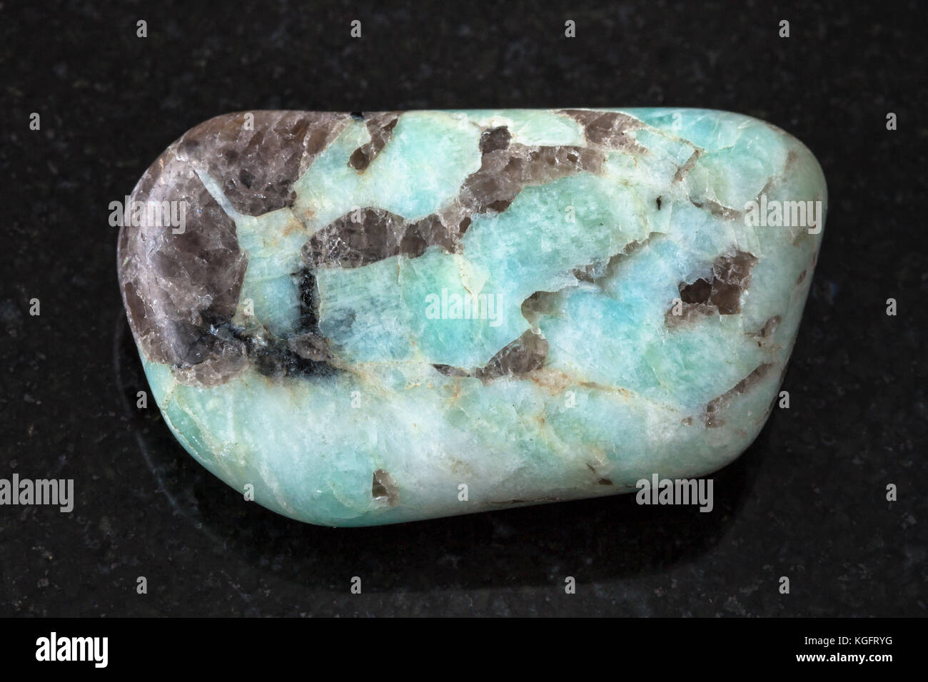 macro shooting of natural mineral rock specimen - tumbled Pegmatite ...