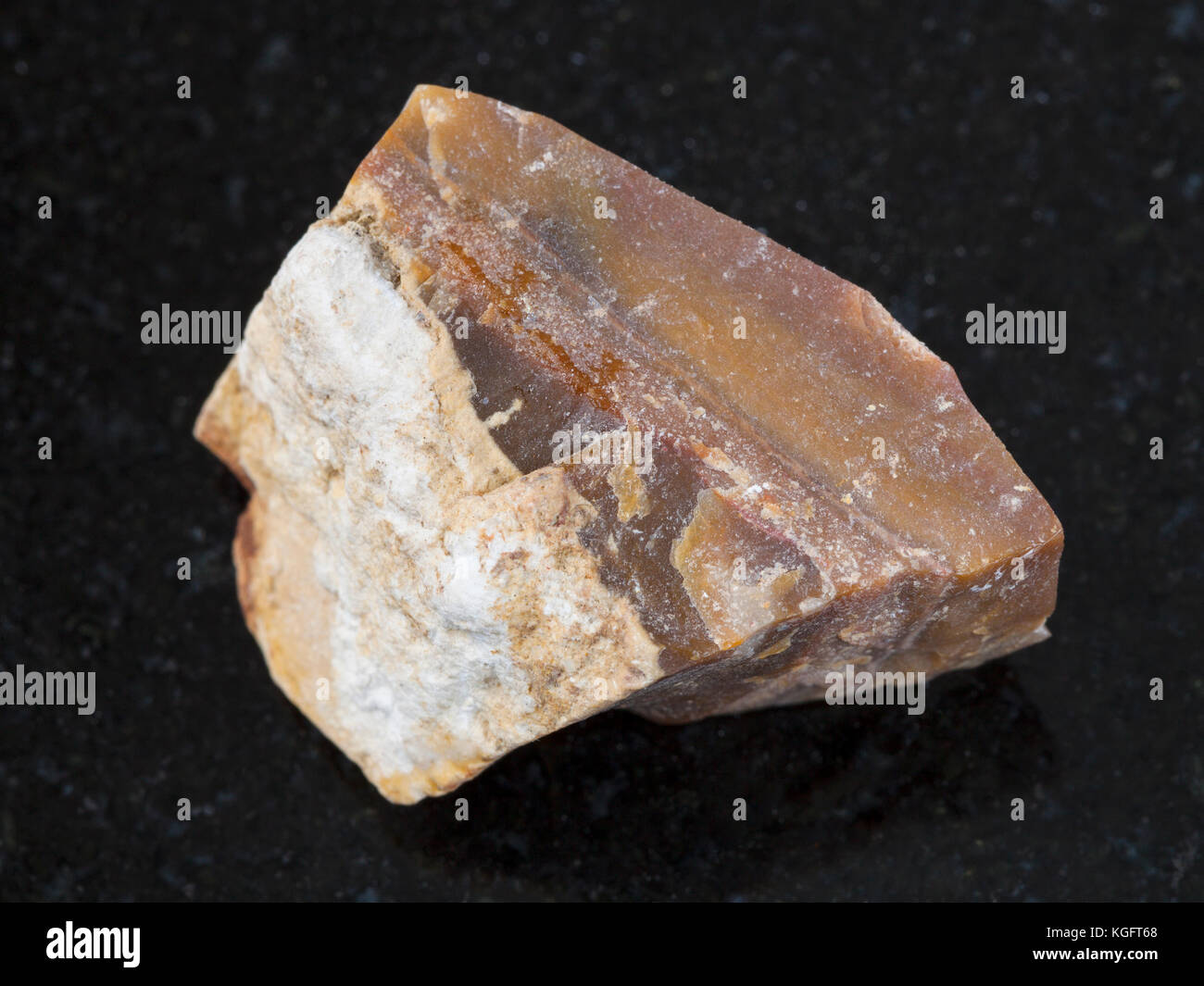 macro shooting of natural mineral rock specimen - raw brown Flint stone ...