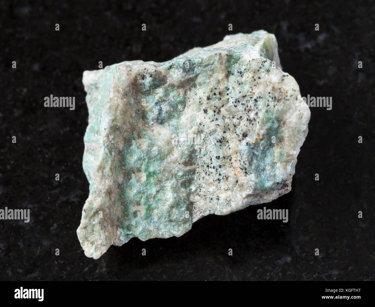 macro shooting of natural mineral rock specimen - raw Listwanite stone ...