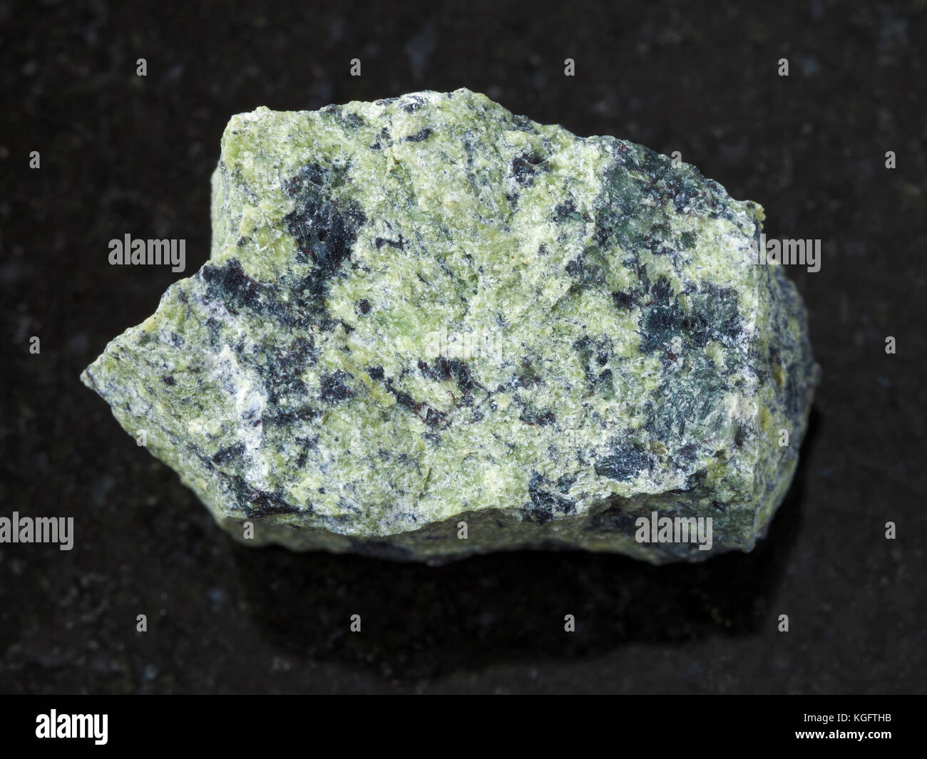 macro shooting of natural mineral rock specimen - rough serpentinite ...