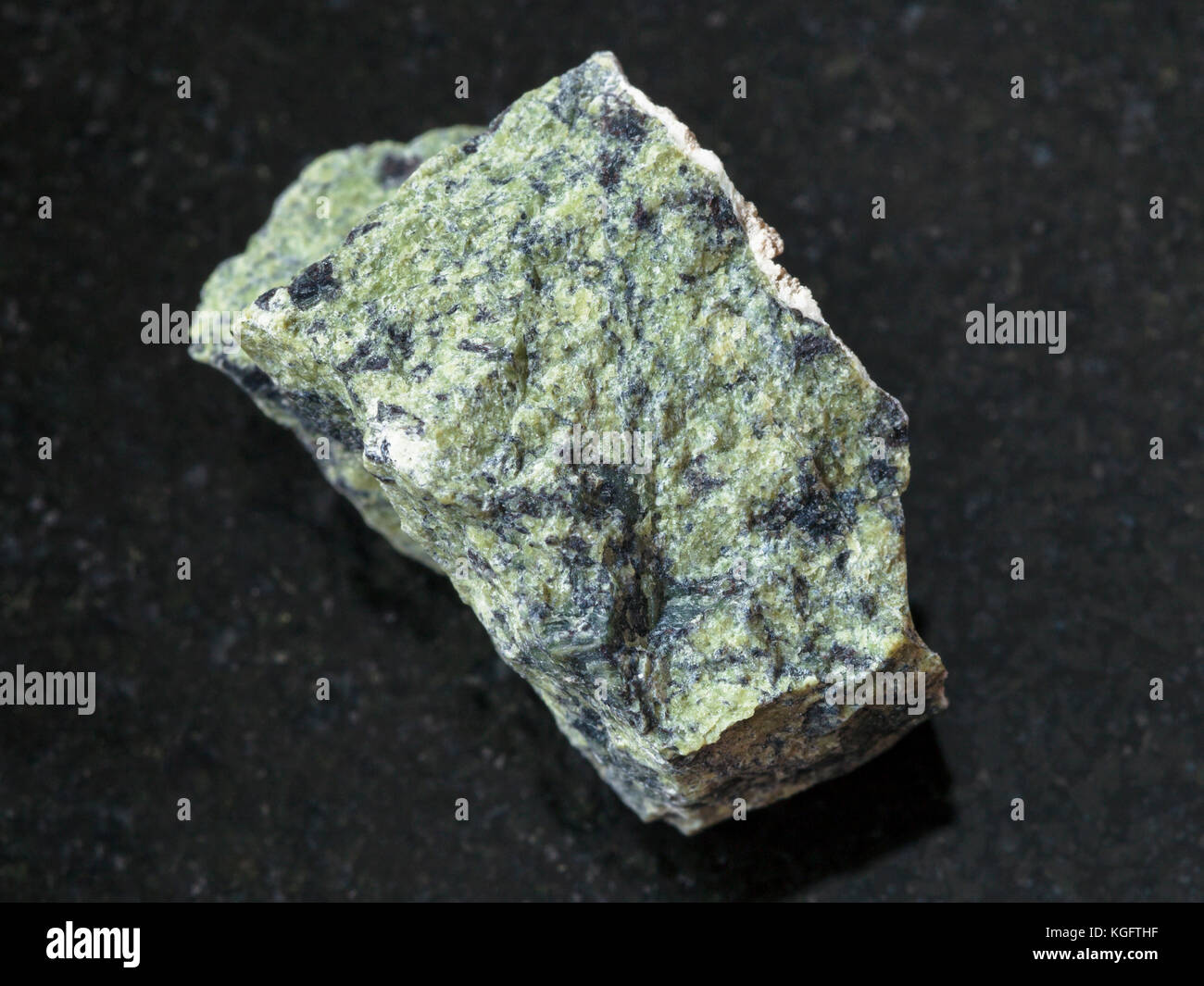 macro shooting of natural mineral rock specimen - raw serpentinite ...