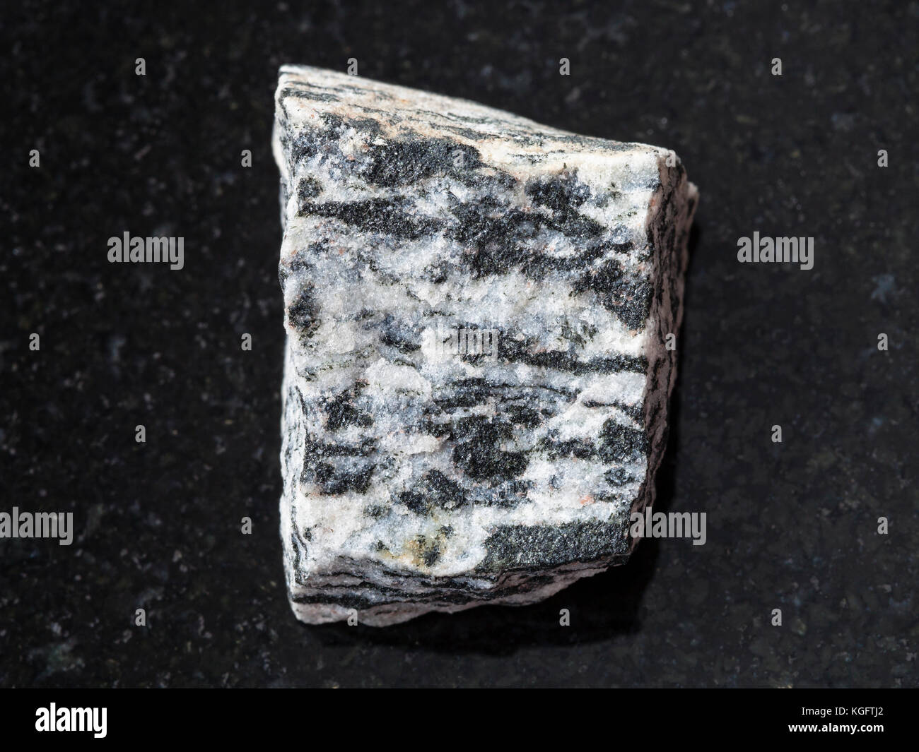 macro shooting of natural mineral rock specimen - rough migmatite stone ...