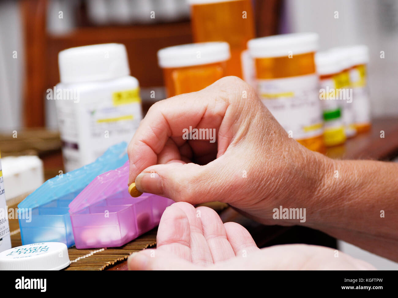 Senior Woman Taking Prescription Medicine and Organizing Pill Box Stock ...