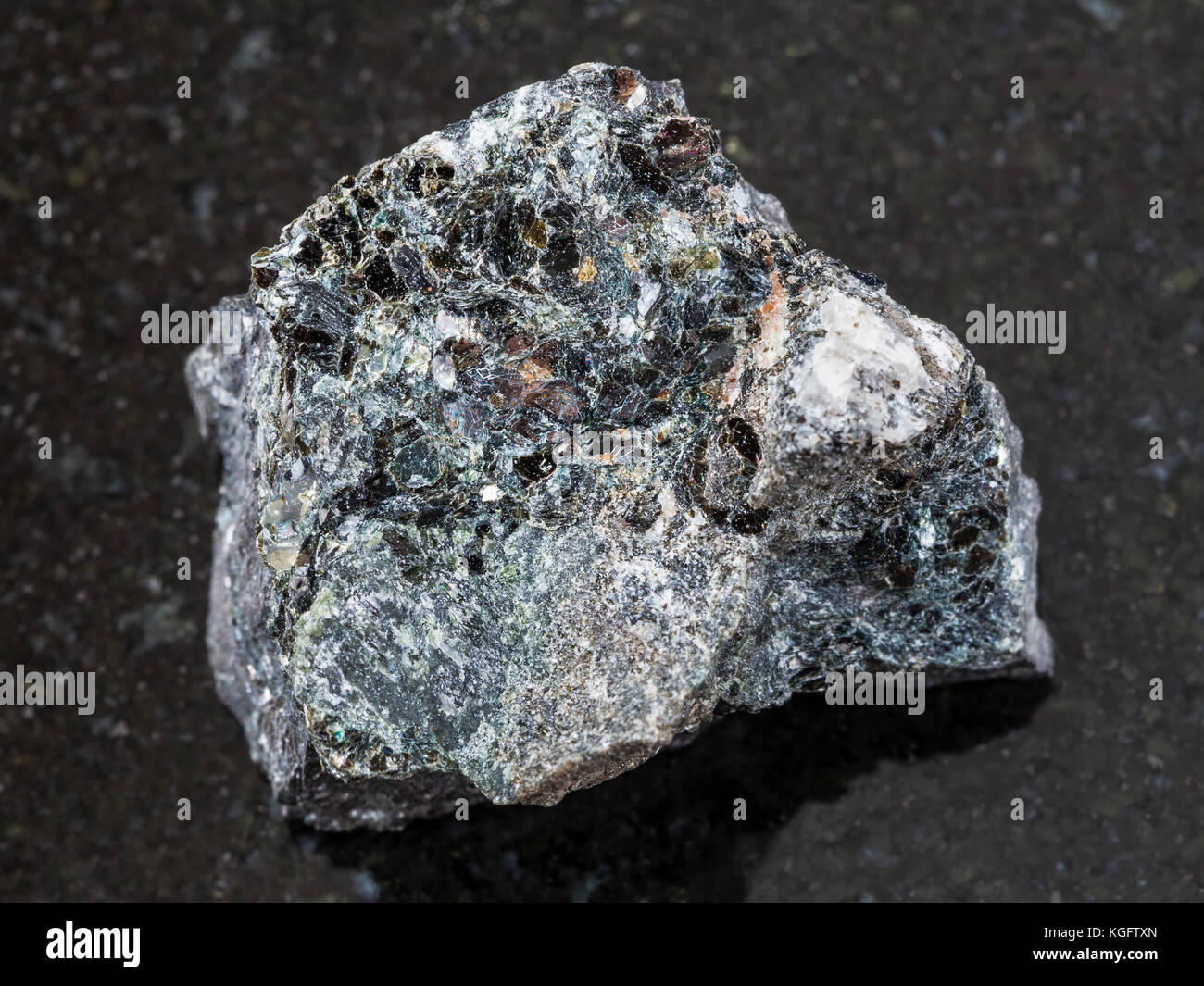 macro shooting of natural mineral rock specimen - raw Magnetite ore on ...