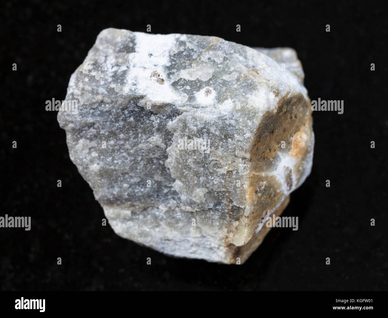 macro shooting of natural mineral rock specimen - piece of raw green ...