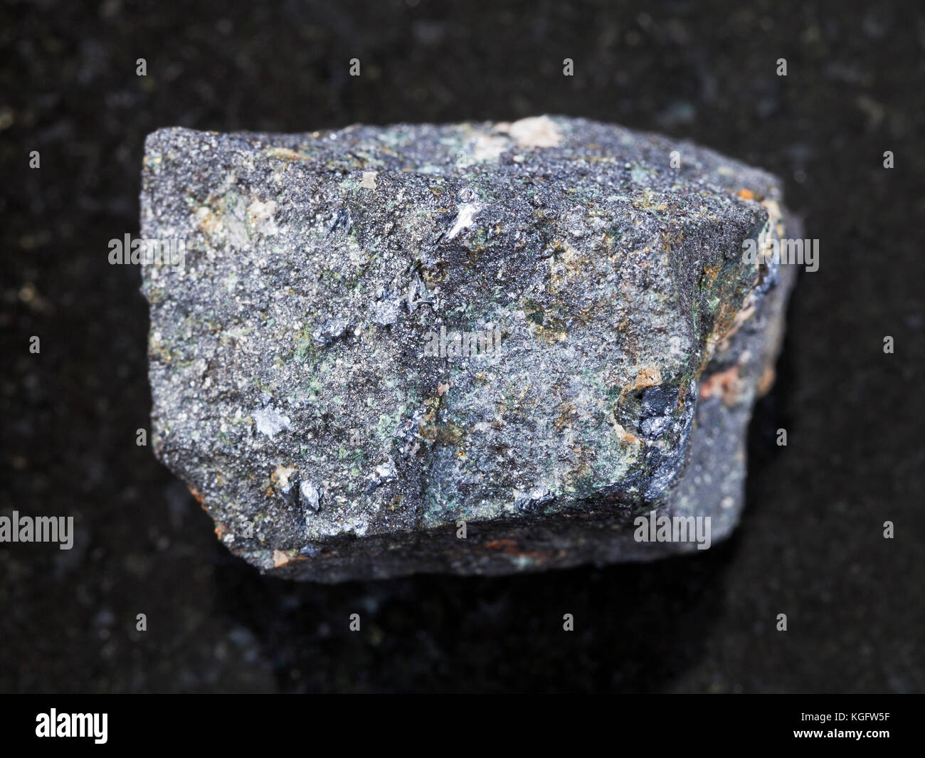 macro shooting of natural mineral rock specimen - raw Molybdenite stone ...