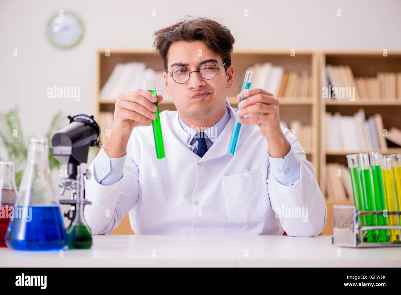 Mad crazy scientist doctor doing experiments in a laboratory Stock ...