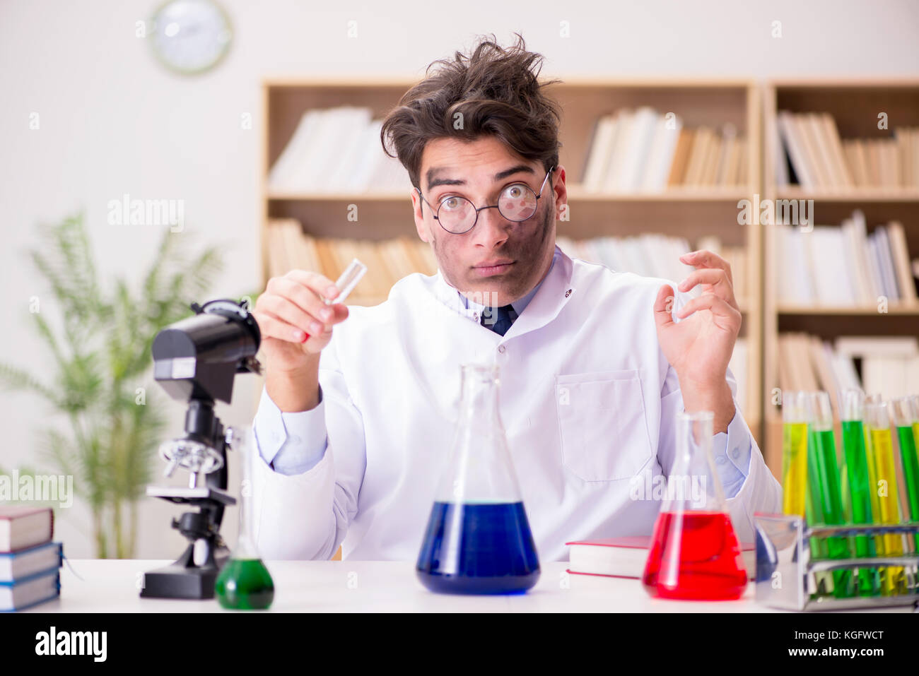 Mad crazy scientist doctor doing experiments in a laboratory Stock ...